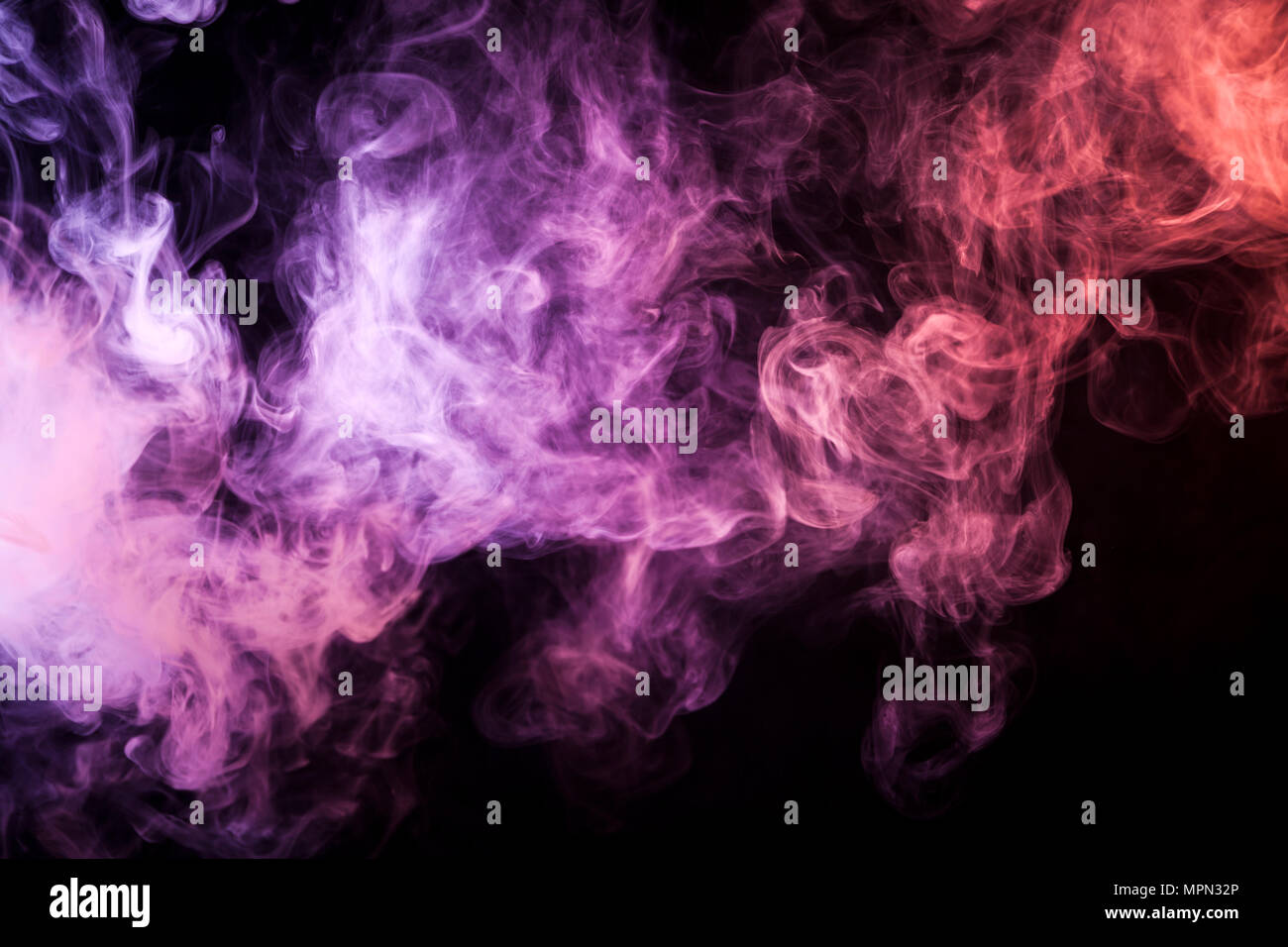Pink, red cloud of smoke of black isolated background. Background from ...