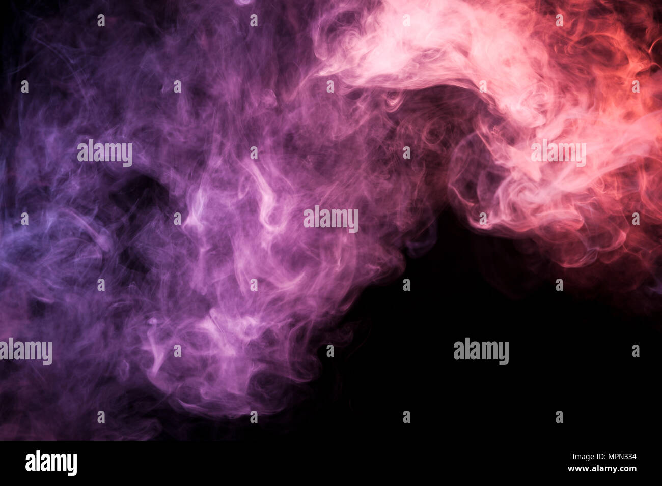 Cloud of red and pink smoke on a black isolated background. Background ...