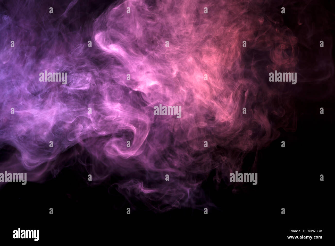Cloud of red and pink smoke on a black isolated background. Background ...