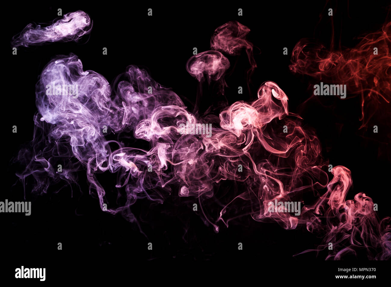 Pink gulal smoke hi-res stock photography and images - Alamy