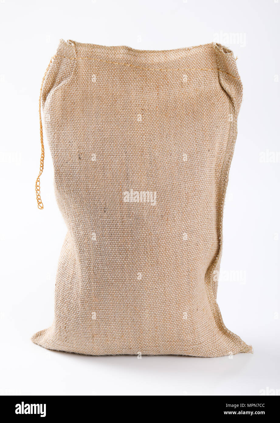 bag full of white long grained rice on white background Stock Photo - Alamy