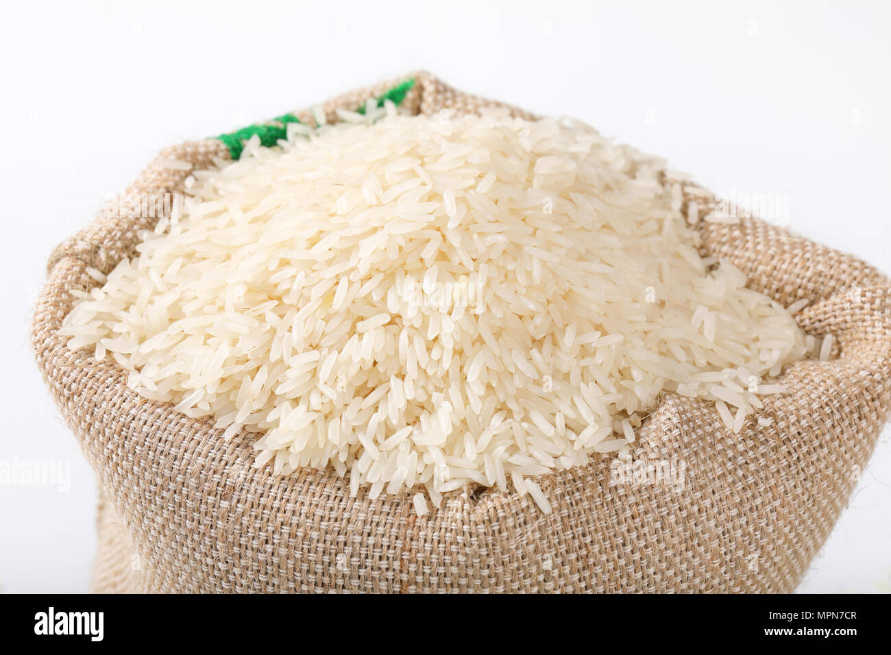 bag full of white long grained rice - close up Stock Photo - Alamy