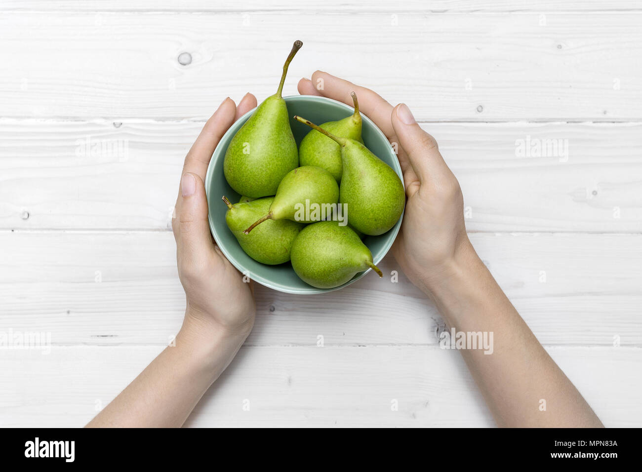 Hand Hands Holding Pear Food High Resolution Stock Photography and ...