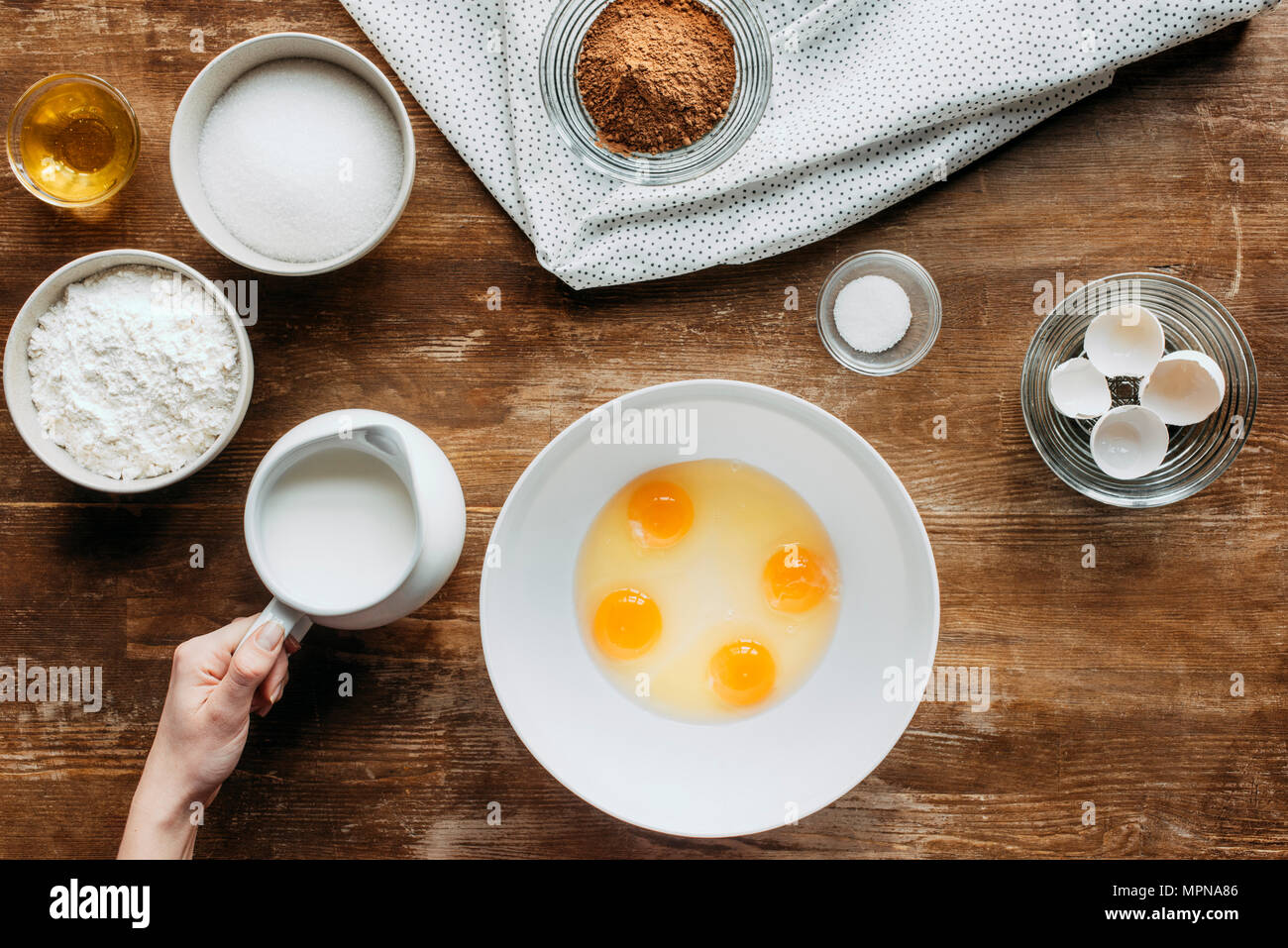 top view of woman mixing ingredients for pastry in bowl Stock Photo - Alamy