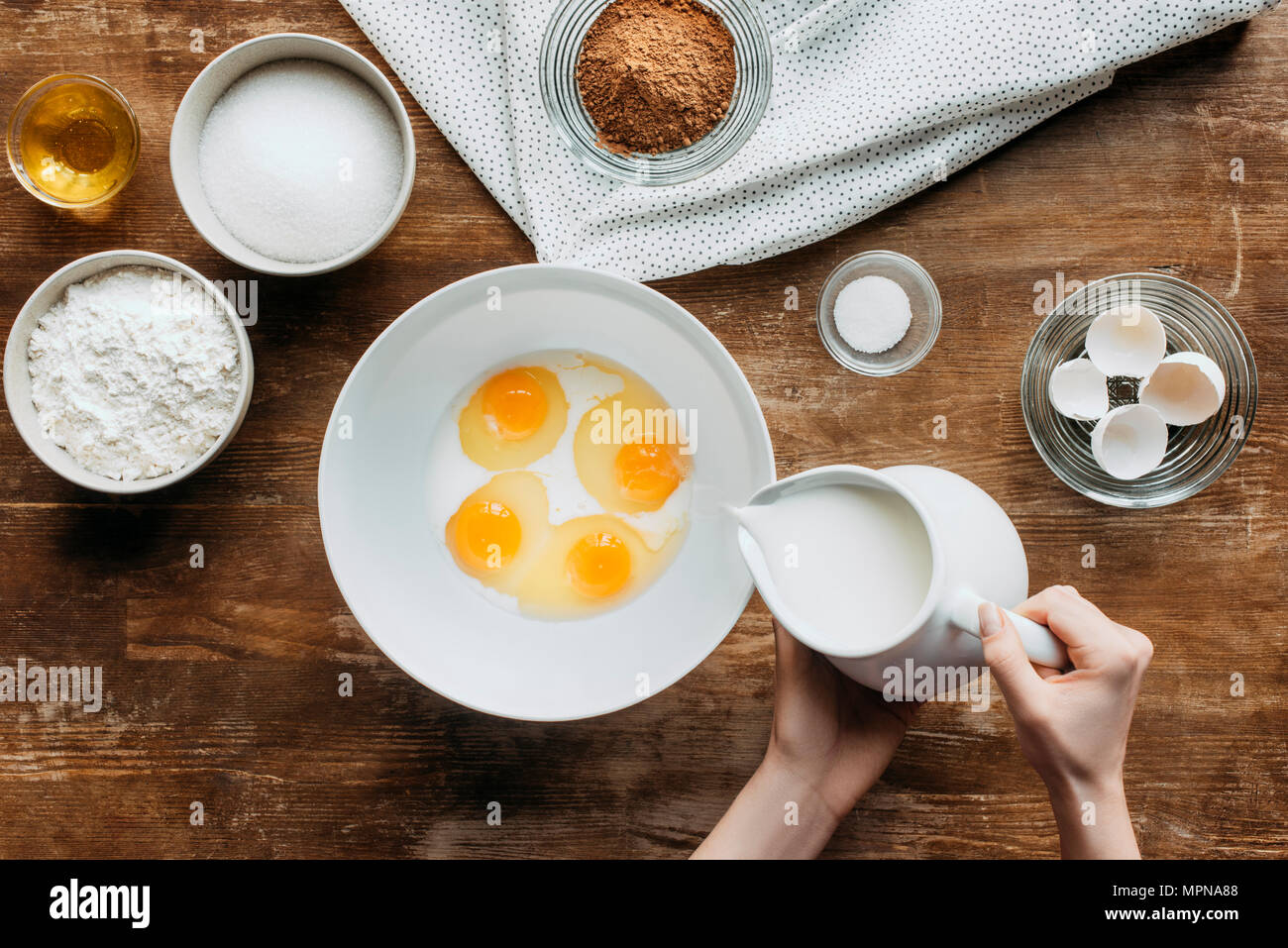 Mixing eggs milk hi-res stock photography and images - Alamy