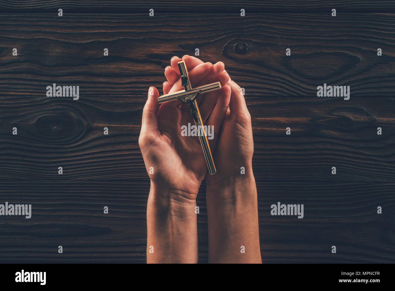Hands holding christian symbol hi-res stock photography and images - Alamy