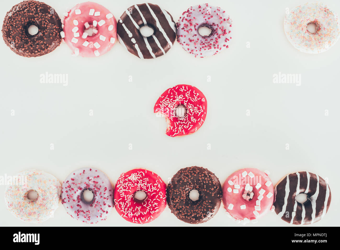 top view of various glazed doughnuts isolated on white Stock Photo - Alamy