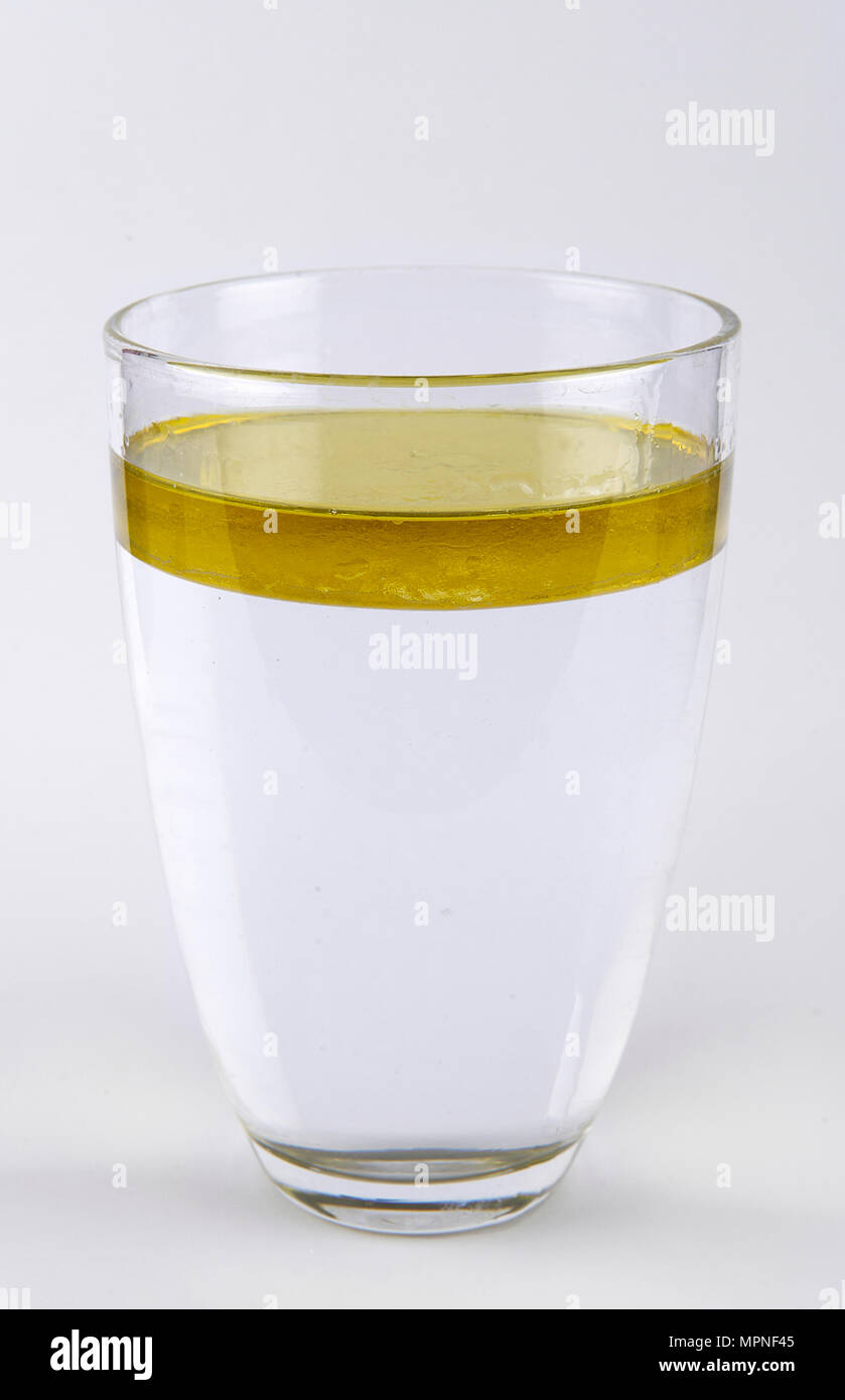 the spilled oil floating in the water Stock Photo - Alamy
