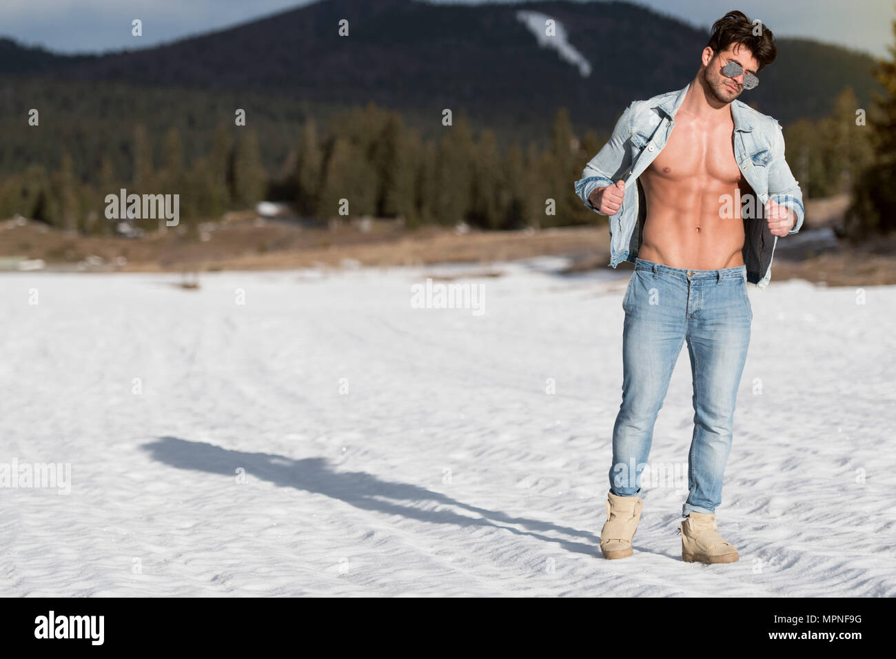 Portrait of a Young Physically Fit Man Showing His Well Trained Body ...