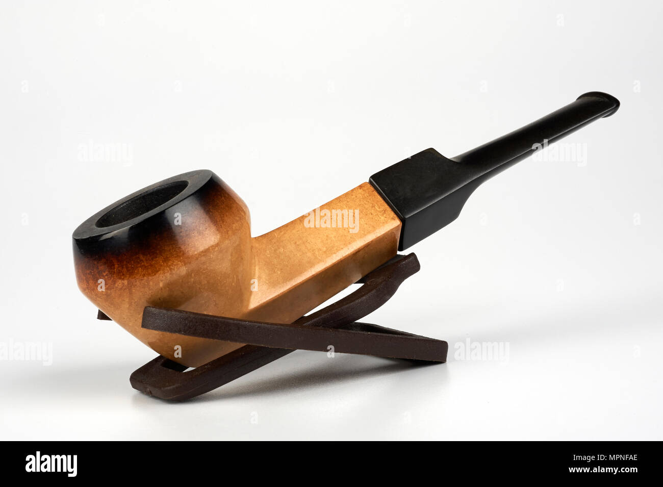 a pipe burl wood on white background Stock Photo - Alamy