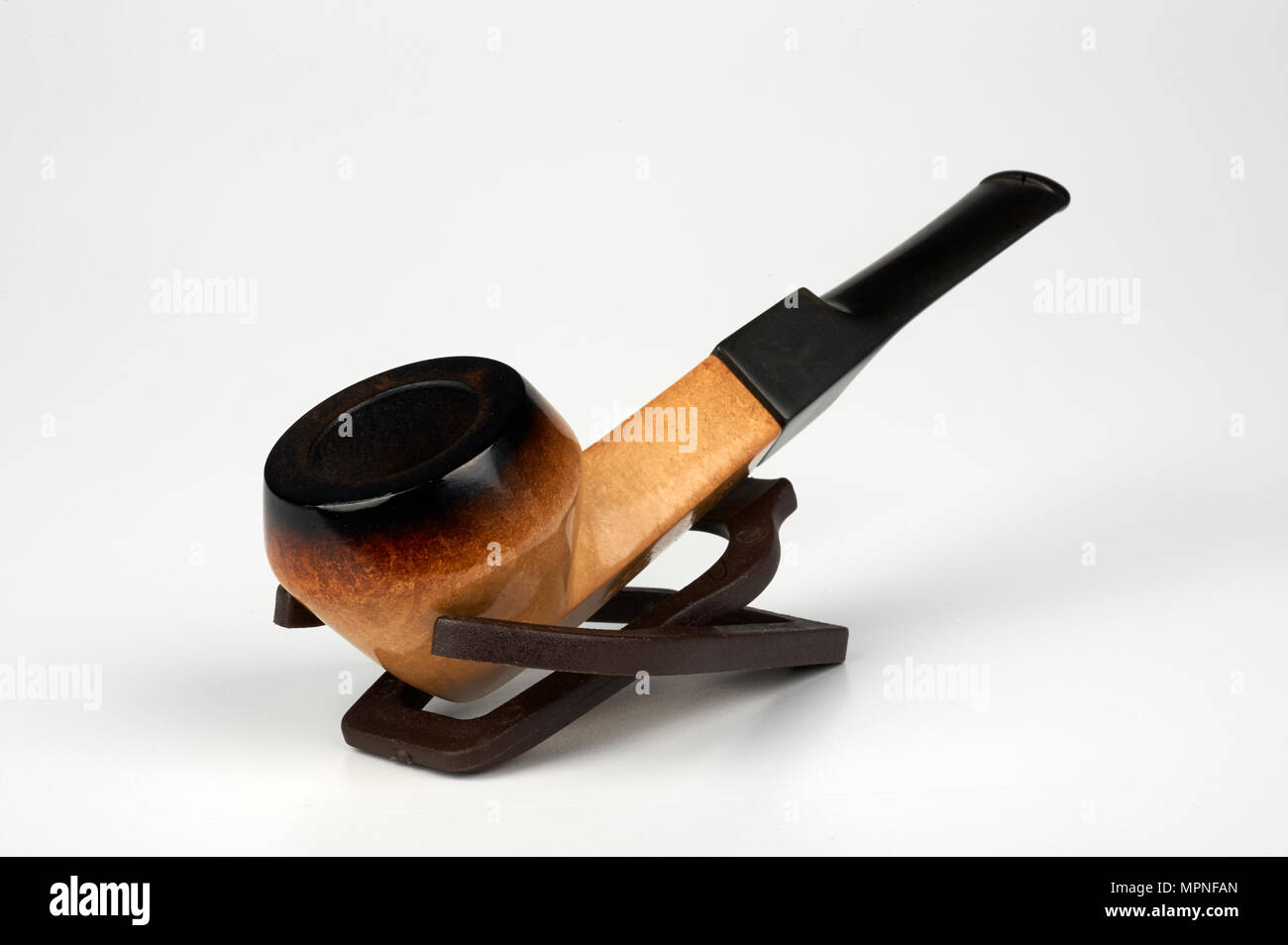 a pipe burl wood on white background Stock Photo - Alamy