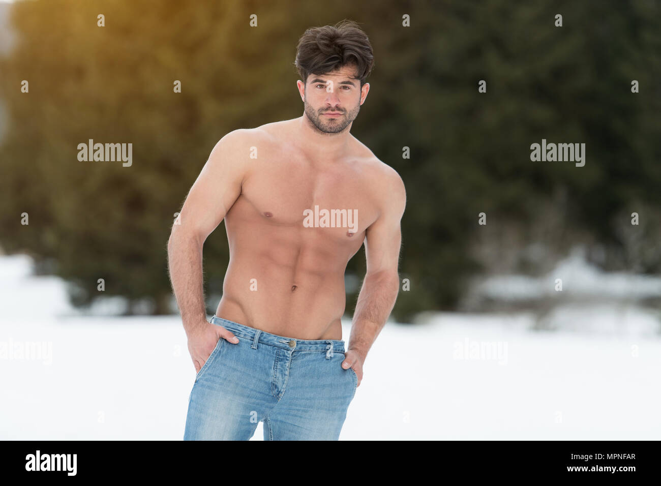 Portrait of a Young Physically Fit Man Showing His Well Trained Body ...