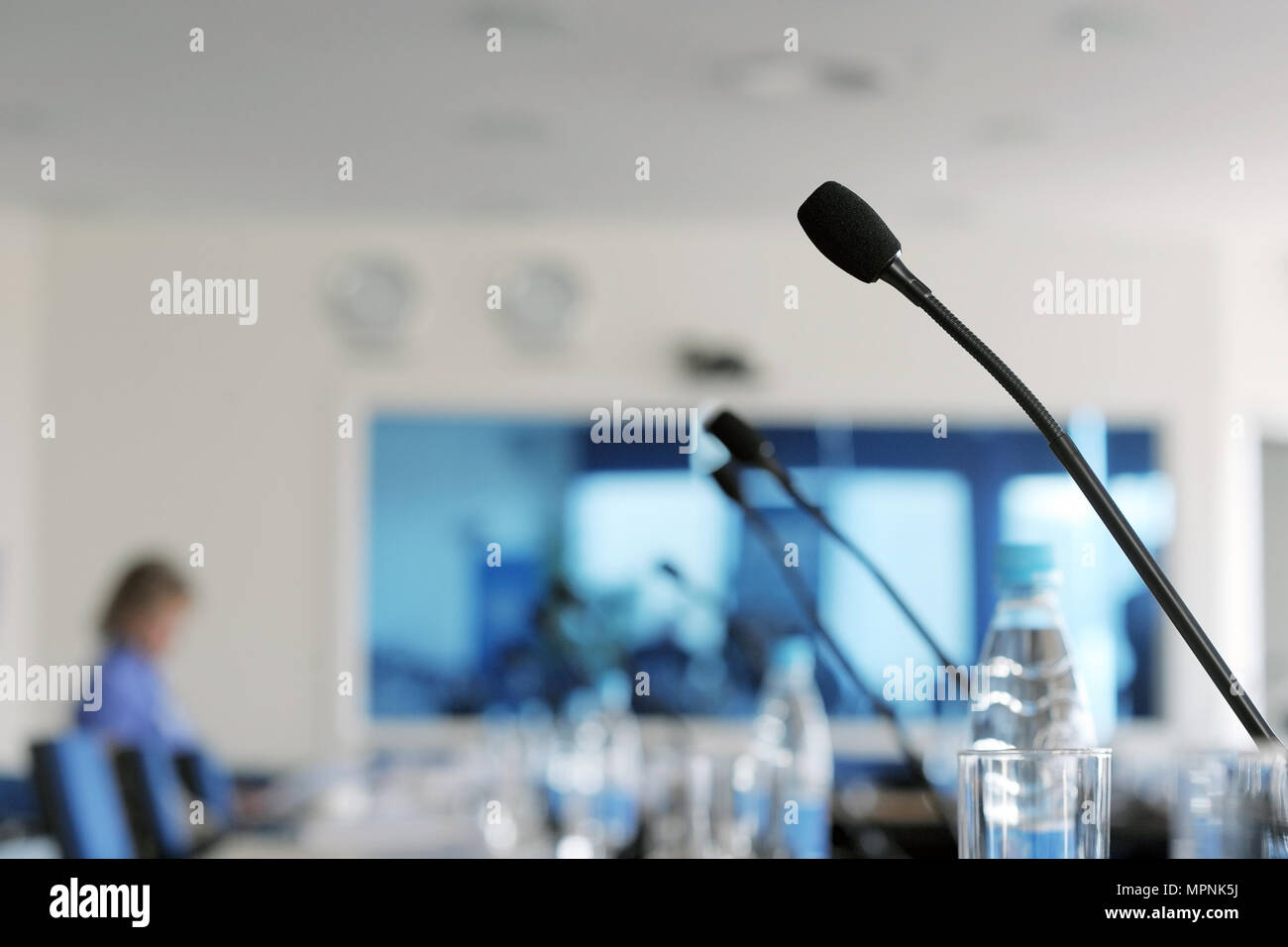 Microphone in a conference room Stock Photo - Alamy
