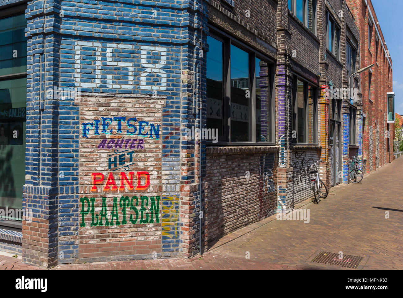 Colorful dutch text on the wall of a bar in Leeuwarden, Netherlands ...
