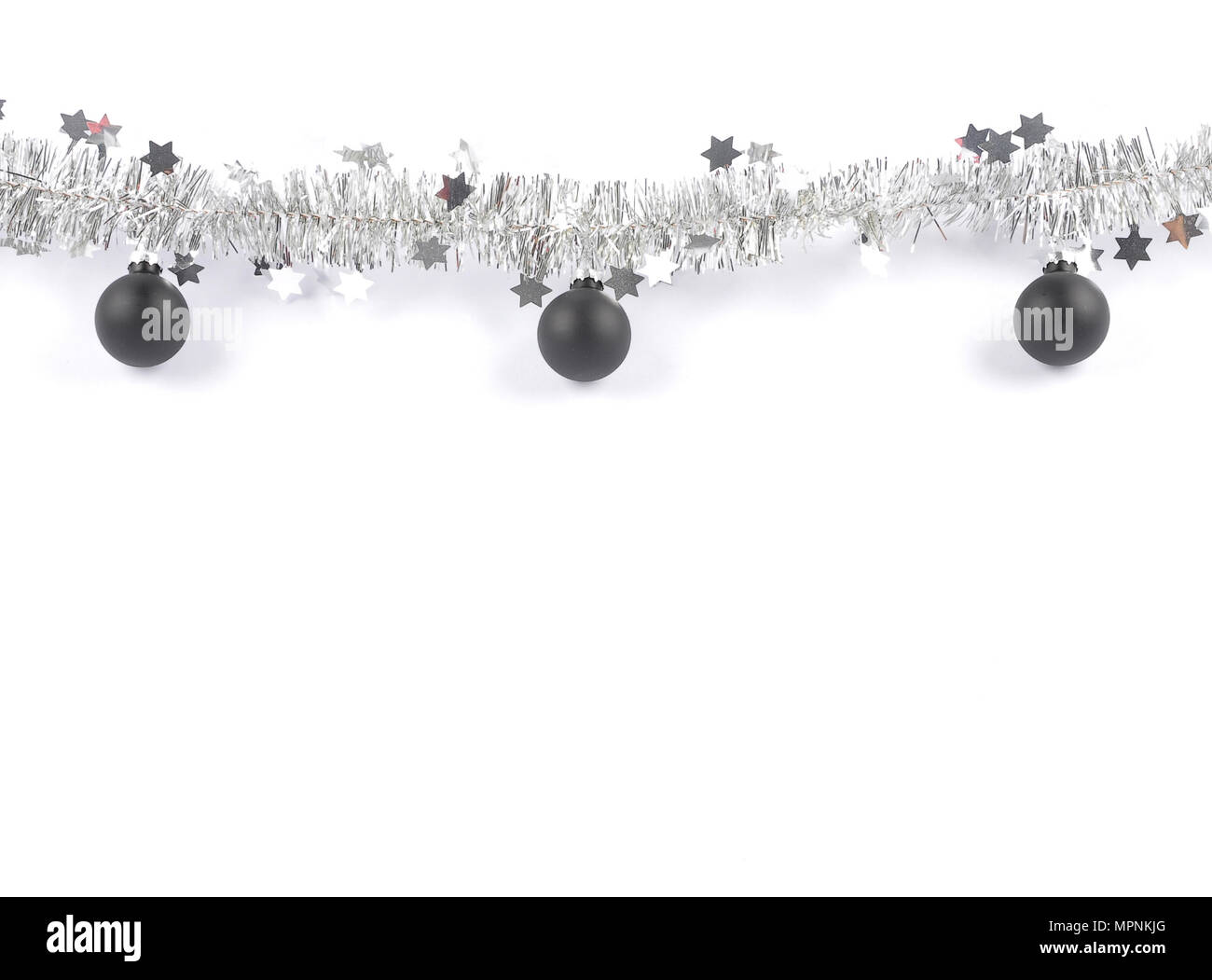 Christmas garland with baubles on white Stock Photo - Alamy