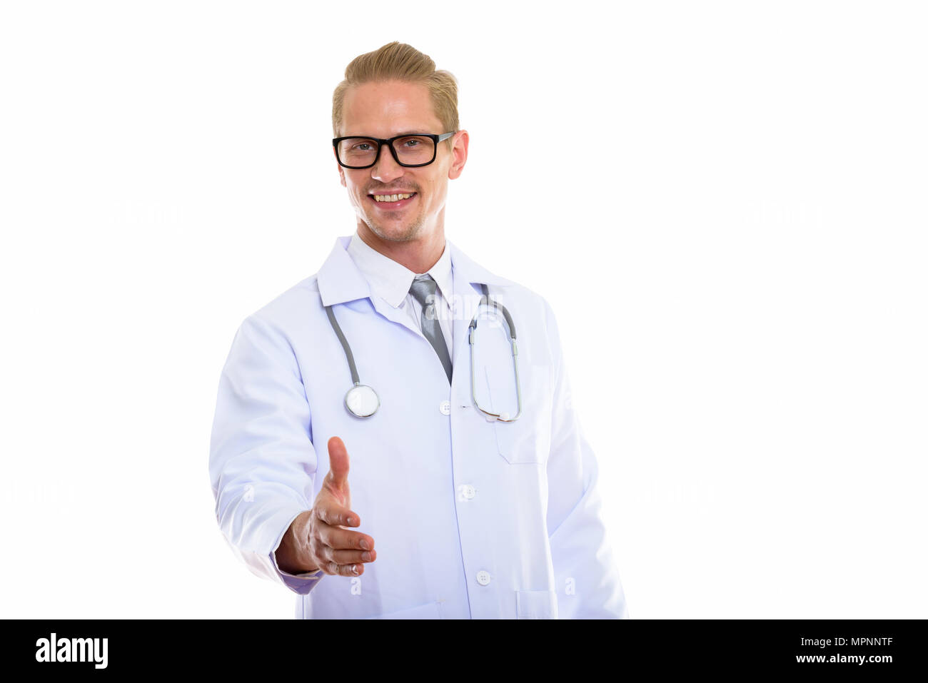 Doctor giving handshake smiling hi-res stock photography and images - Alamy