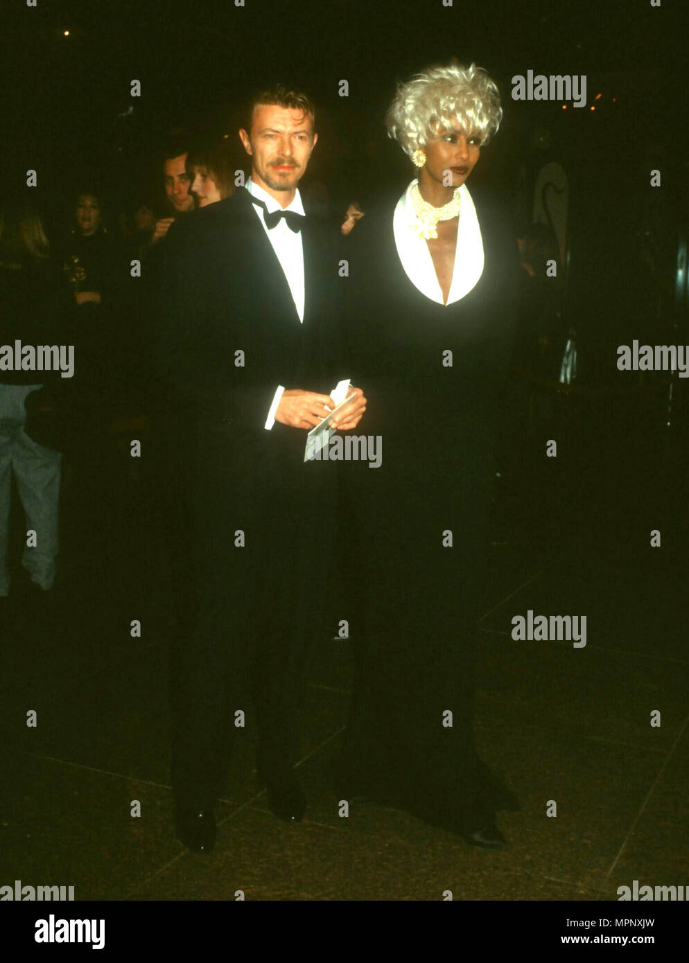 WEST HOLLYWOOD, CA - MARCH 4: (L-R) Singer David Bowie and Model Iman ...