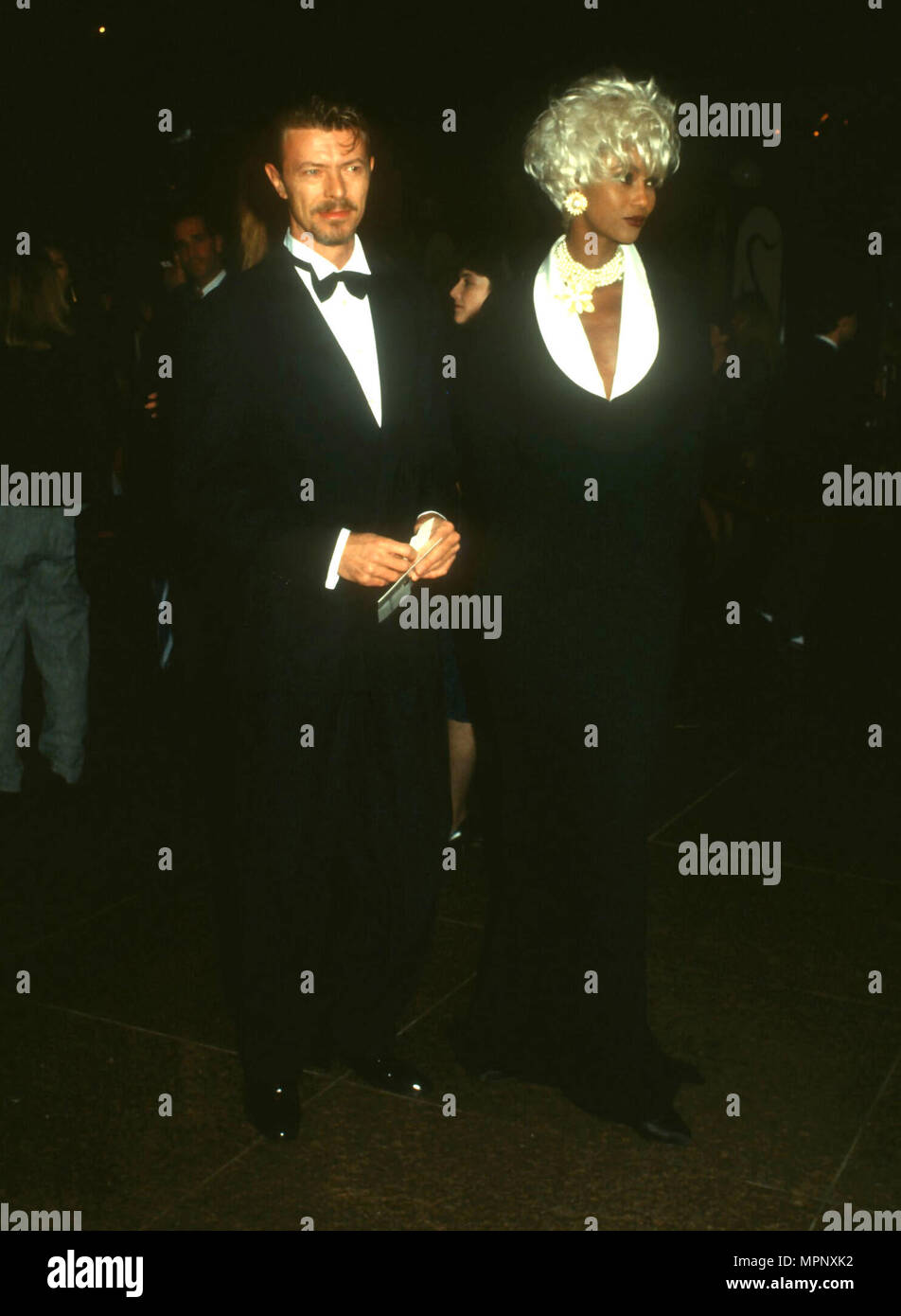 WEST HOLLYWOOD, CA - MARCH 4: (L-R) Singer David Bowie and Model Iman ...