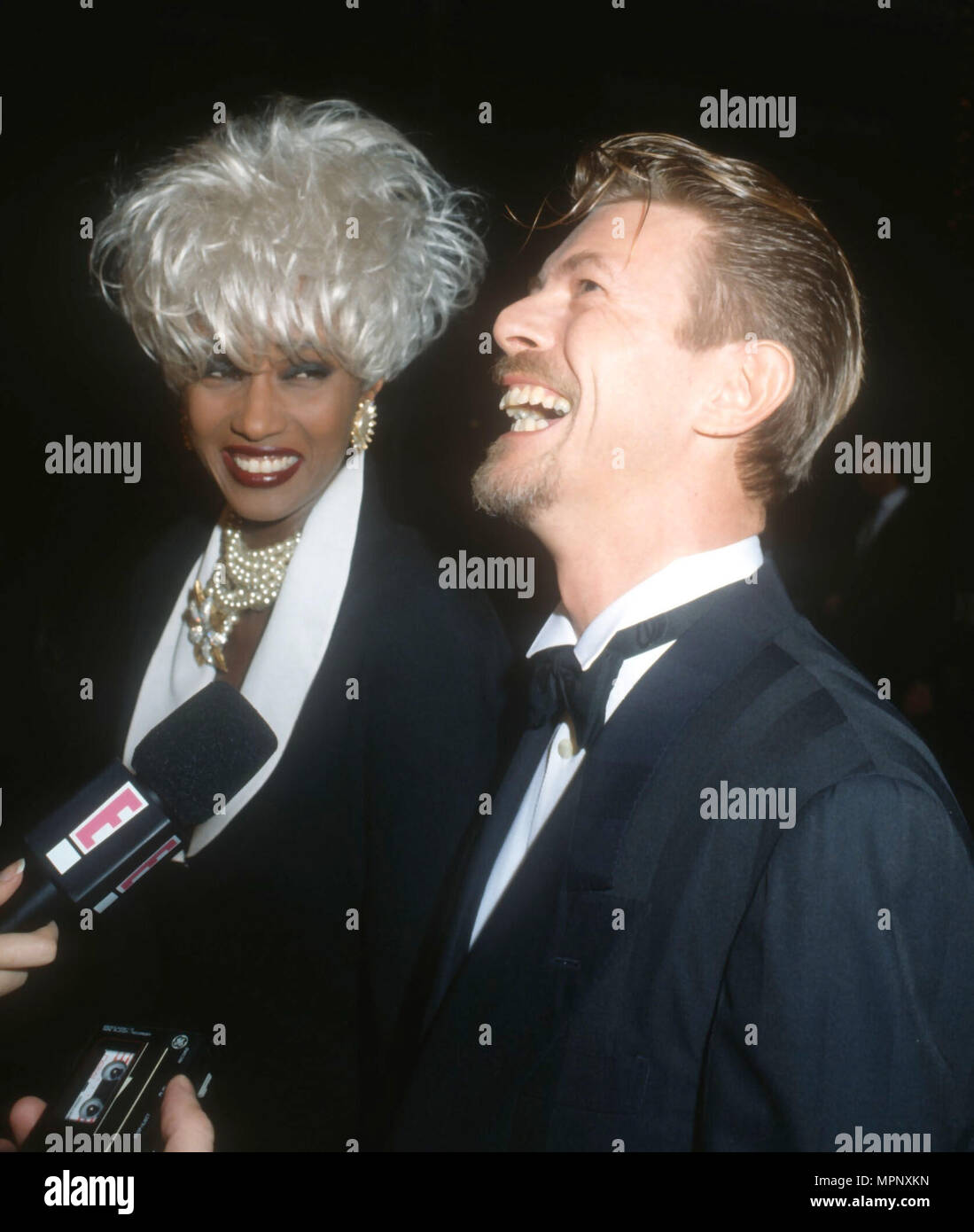 WEST HOLLYWOOD, CA - MARCH 4: (L-R) Model Iman and singer David Bowie ...