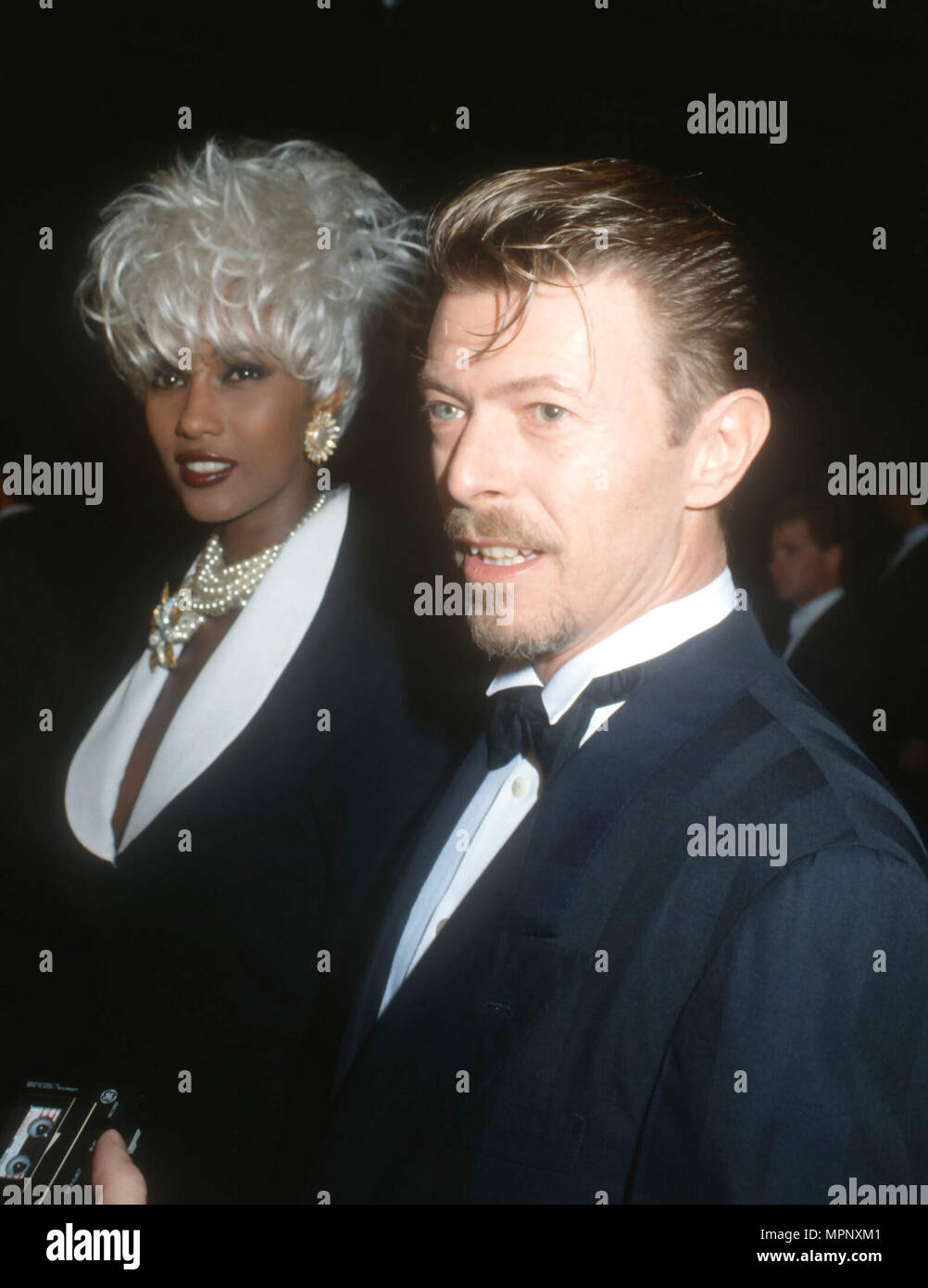 WEST HOLLYWOOD, CA - MARCH 4: (L-R) Model Iman and singer David Bowie ...