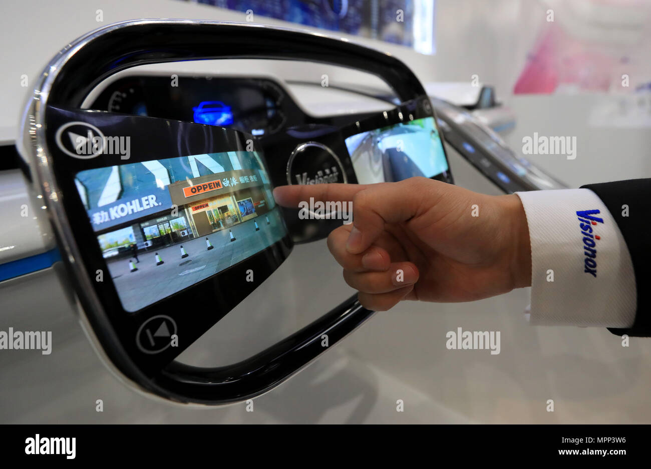 Los Angeles, USA. 23rd May, 2018. A staff member of China's Visionox ...