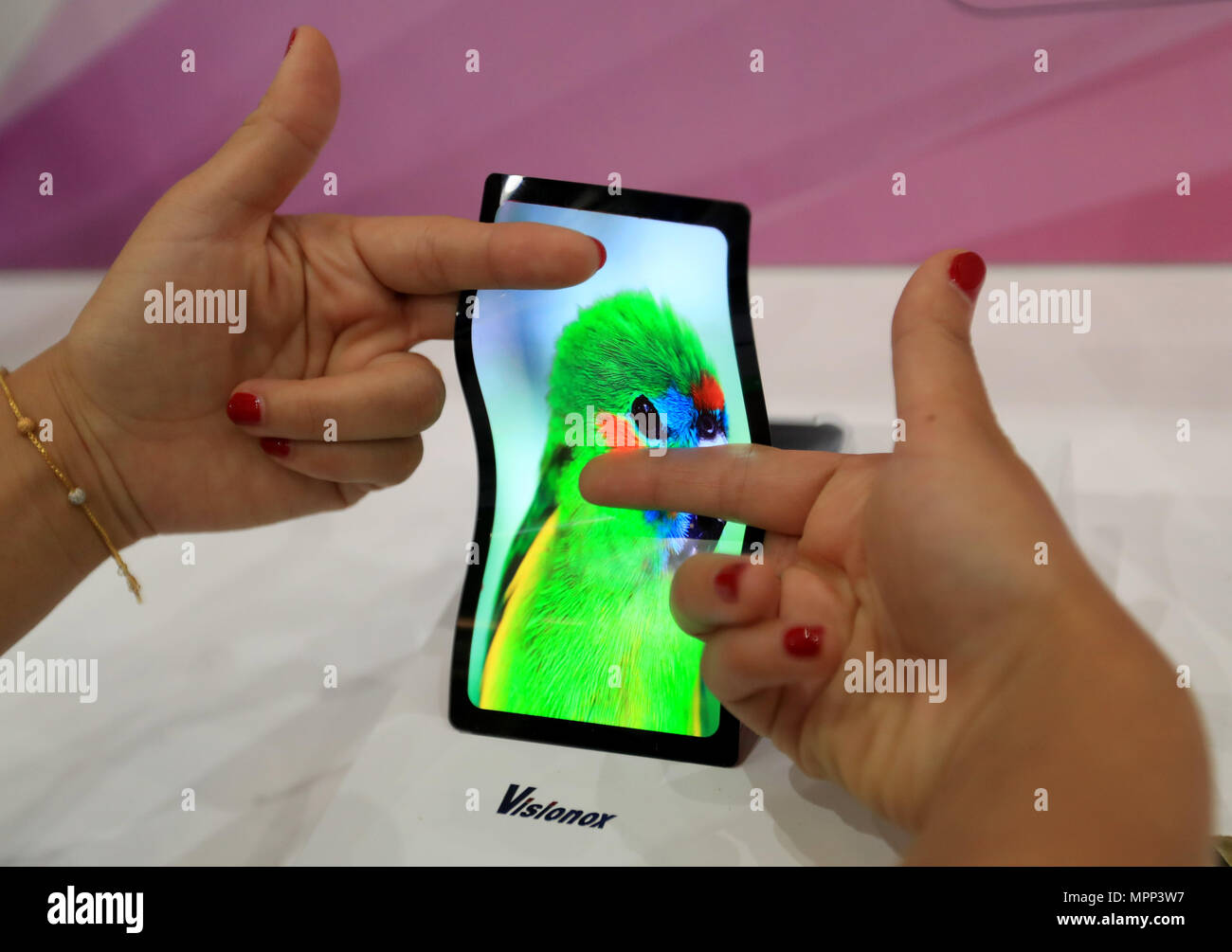 Los Angeles, USA. 23rd May, 2018. A staff member of China's Visionox ...