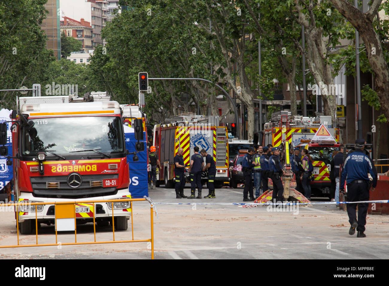 Rescue units seen near the building collapse site. The Martinez Campos ...