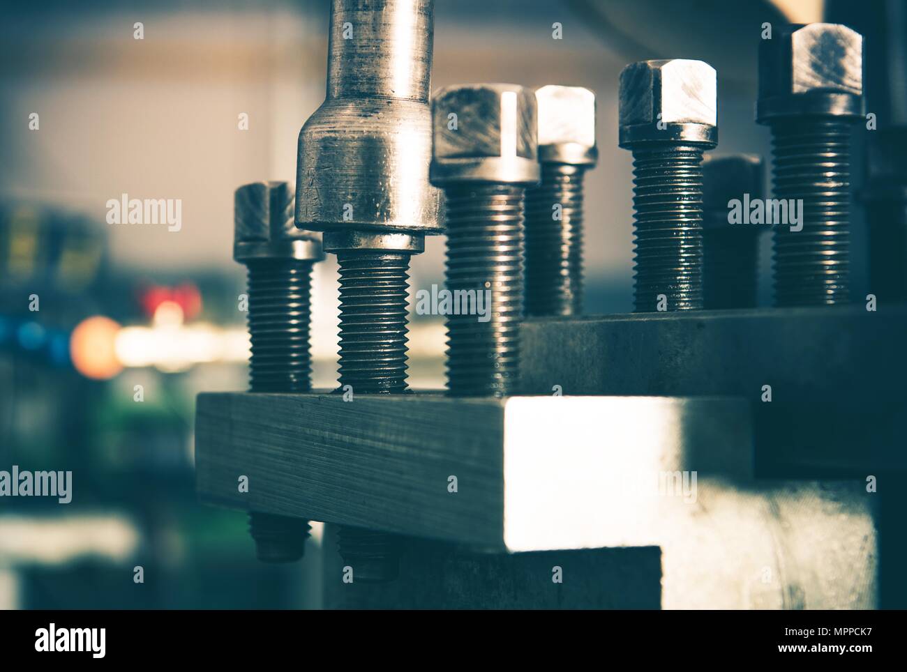 Industrial Grade Bolts Fasteners on the Lathe Machinery. Closeup Photo ...