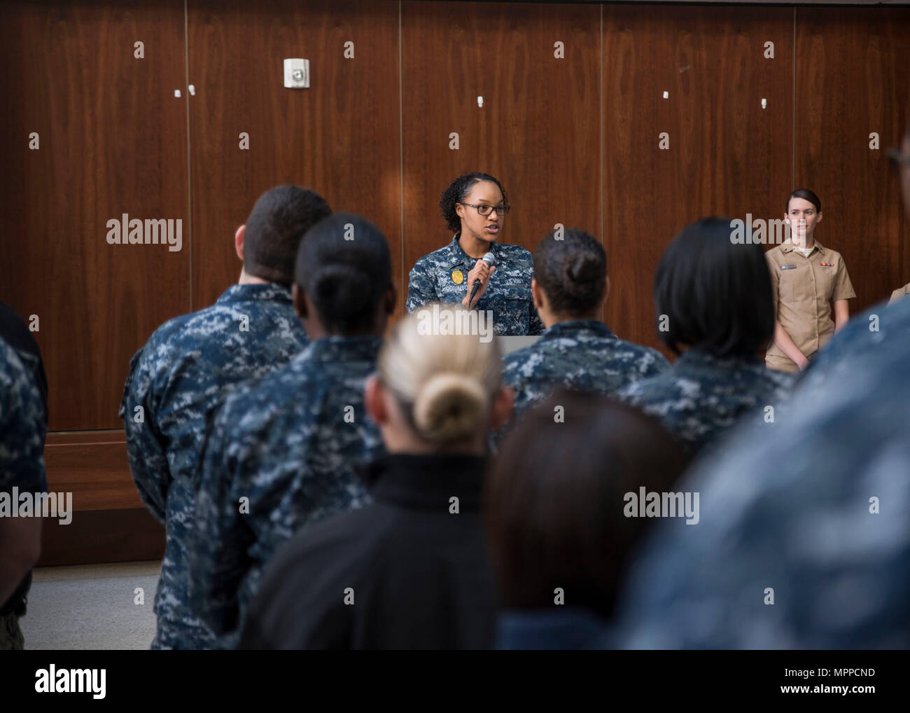 Master-at-Arms 2nd Class Veronica Robinson speaks to a crowd at Naval ...