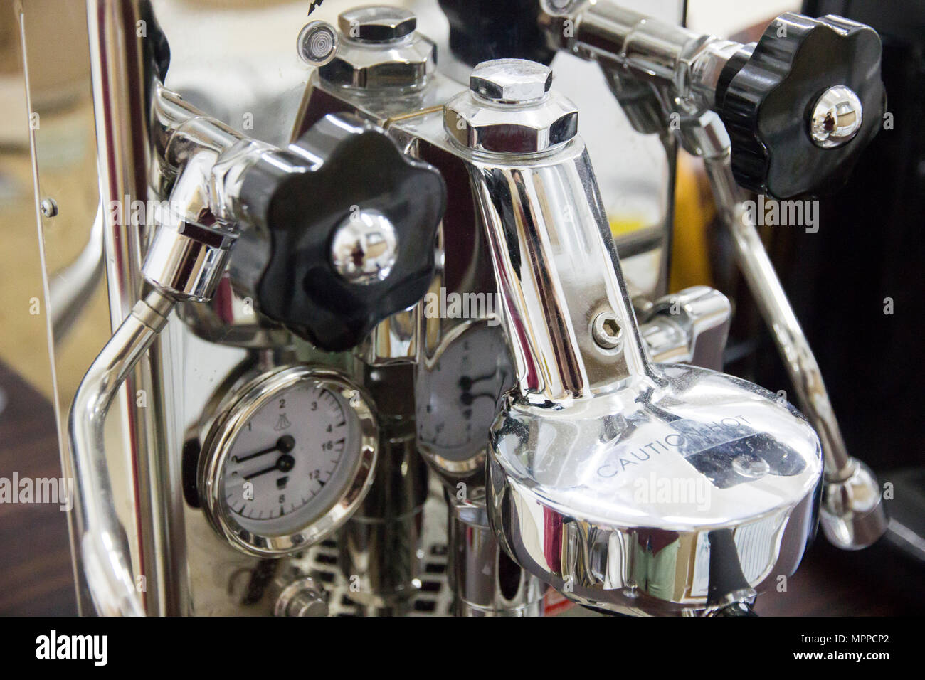 Different elements of modern coffee machine closeup Stock Photo - Alamy