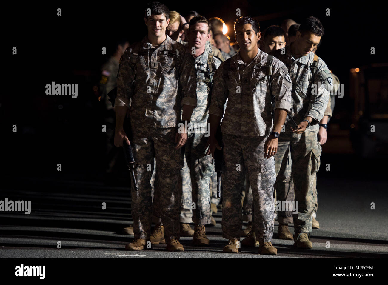 U.S. Army rangers wait for their team to be called in the opening ...