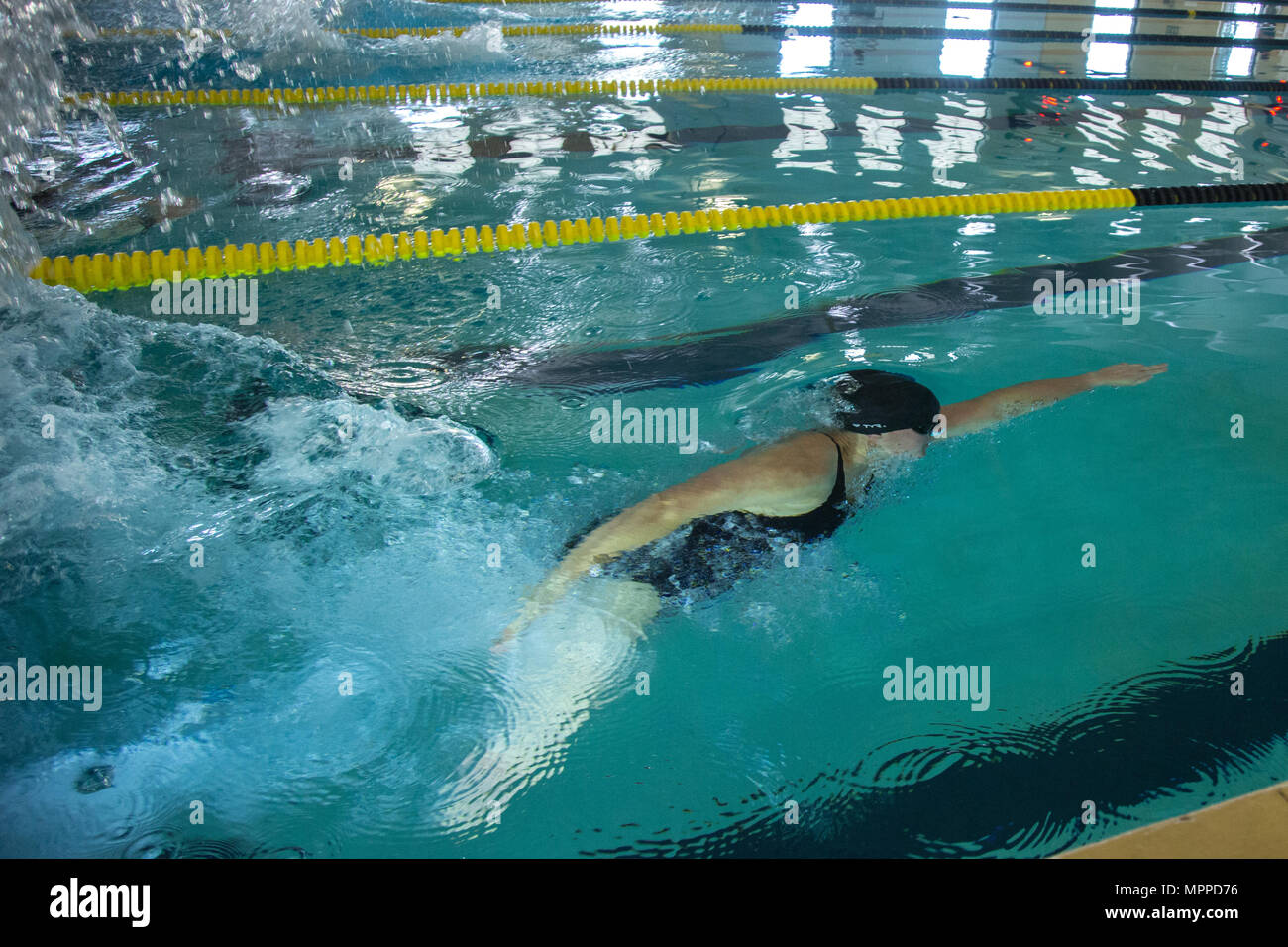 U.S. Army veterans Christy Gardner, compete in the swimming event at ...