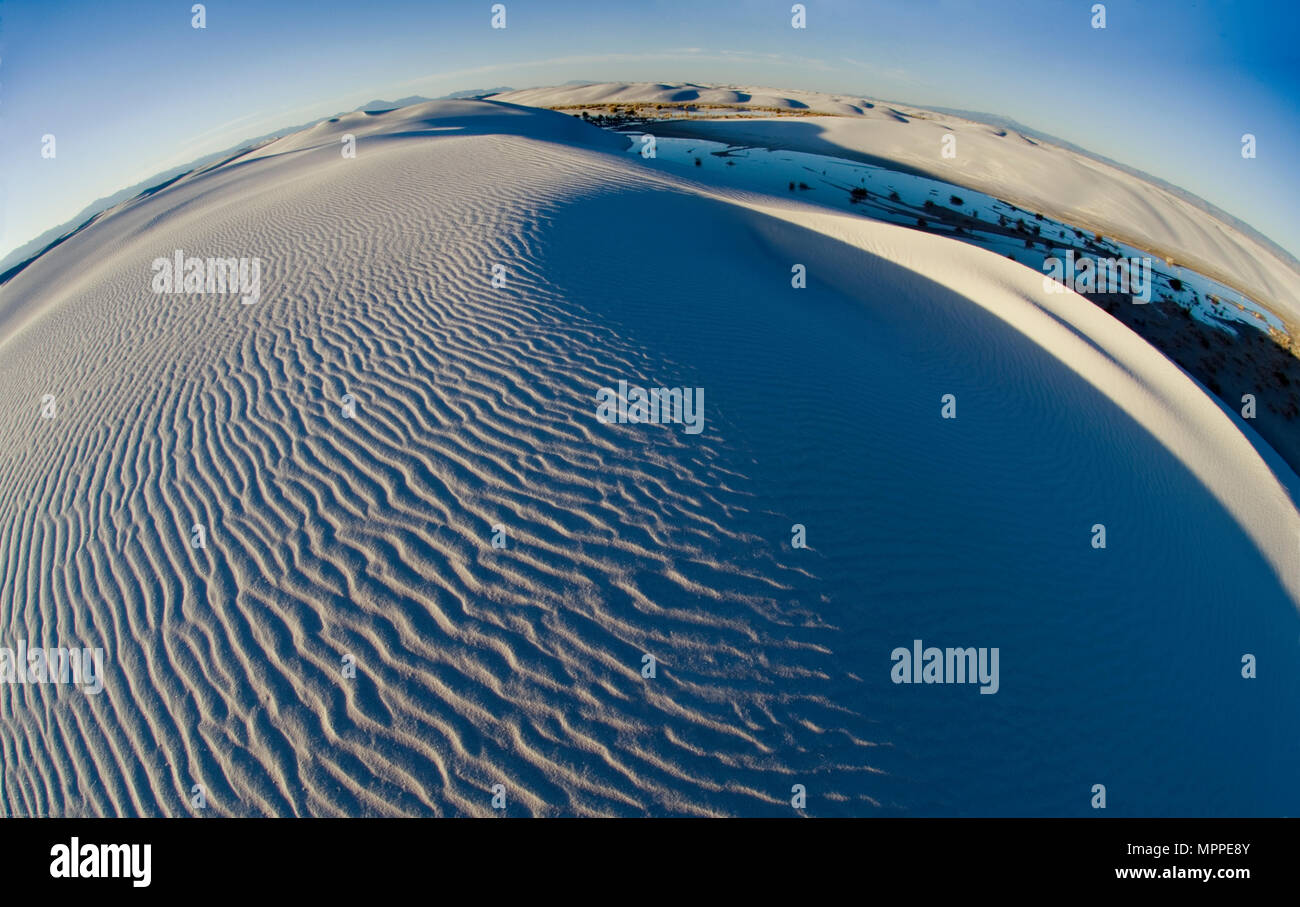 Swirling ridges and textured patterns of sand accentuate a more global ...
