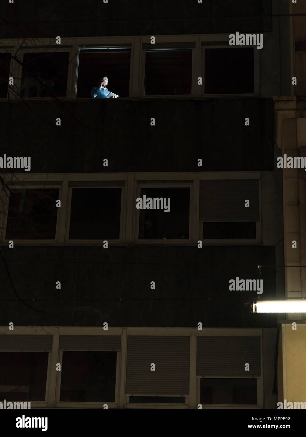 Man working late in office Stock Photo - Alamy