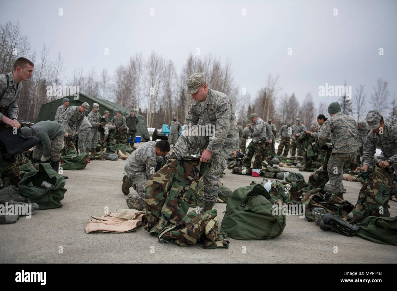 U.S. Air Force Airman Austin Romanov, a 354th Civil Engineer Squadron ...