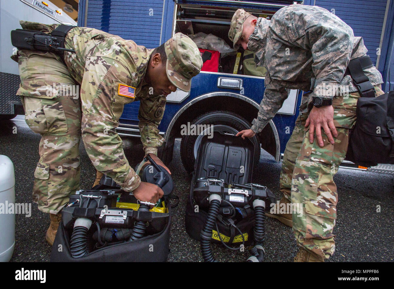Survey team members Sgt. Quran Williams, left, and Staff Sgt. Nicky Lam ...