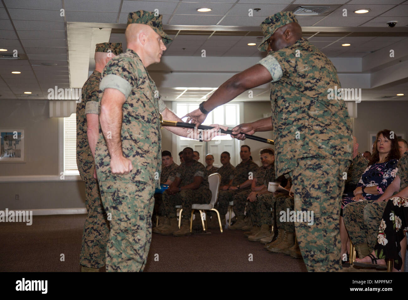 U.S. Marine Corps Col. Farrell J. Sullivan, left, commanding officer ...