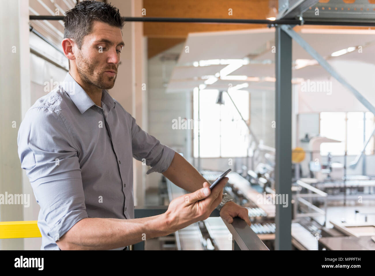 Factory cell phones hi-res stock photography and images - Alamy