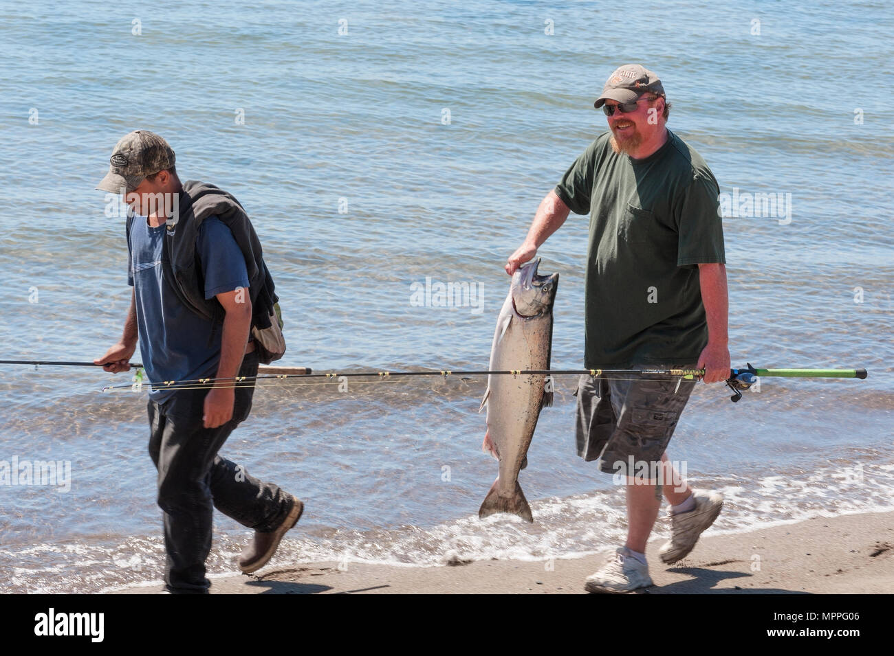 Two men catch hi-res stock photography and images - Alamy