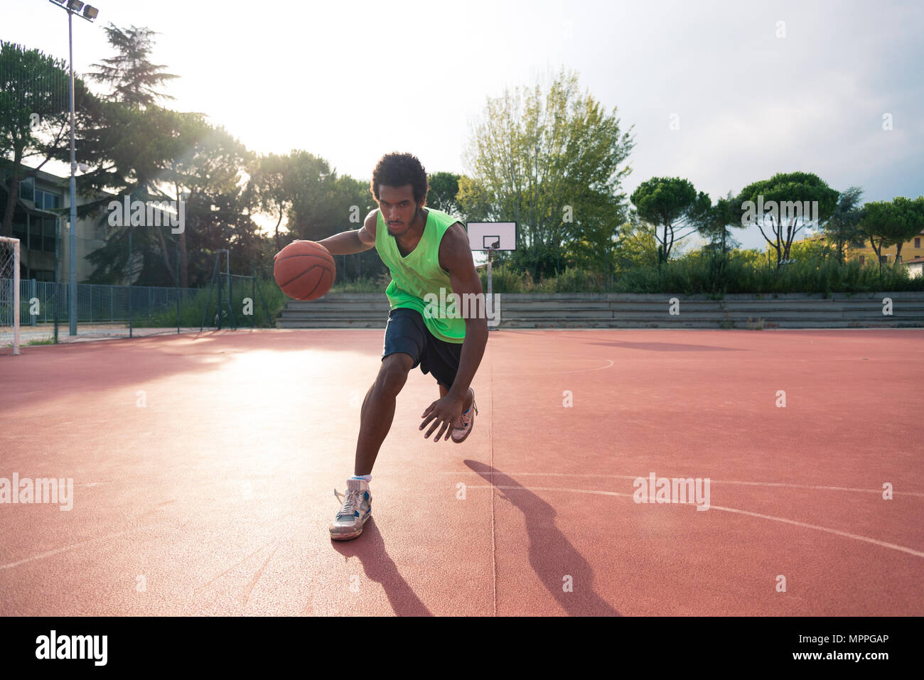 Playing basketball hi-res stock photography and images - Alamy