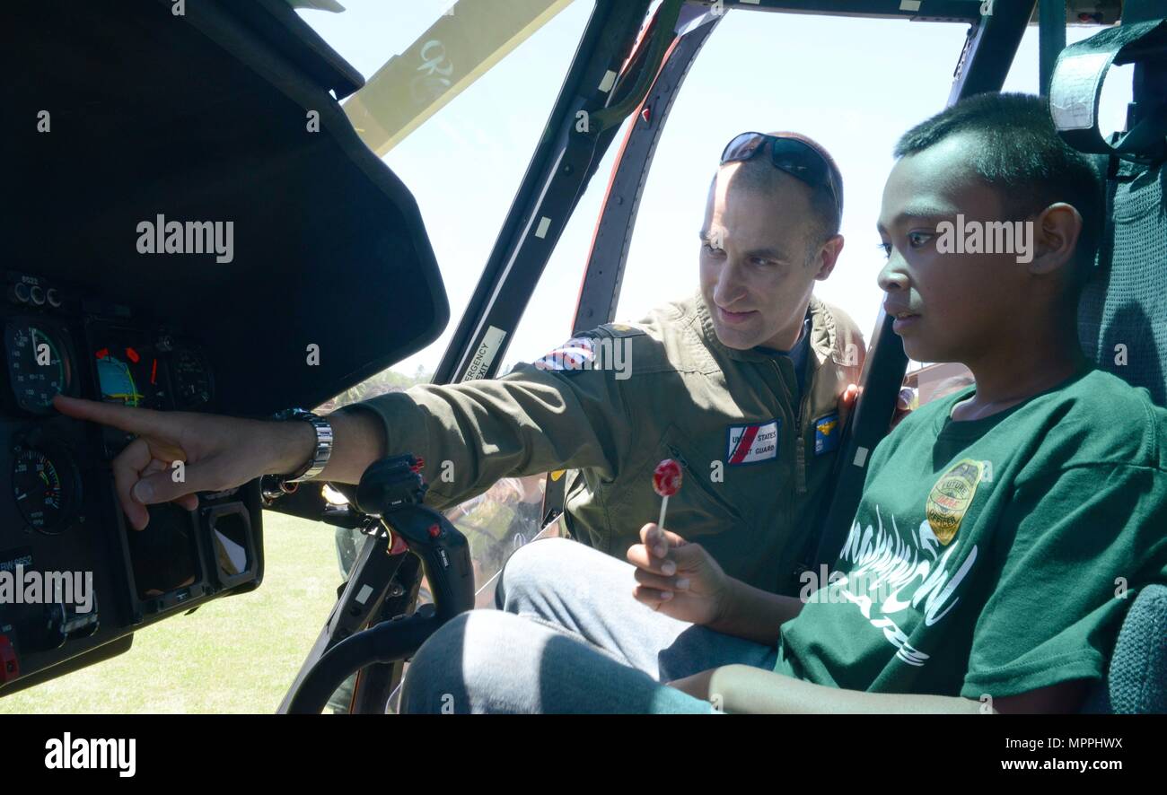 Lt. Ryan Popiel, an MH-65 Dolphin helicopter pilot from Coast Guard Air ...
