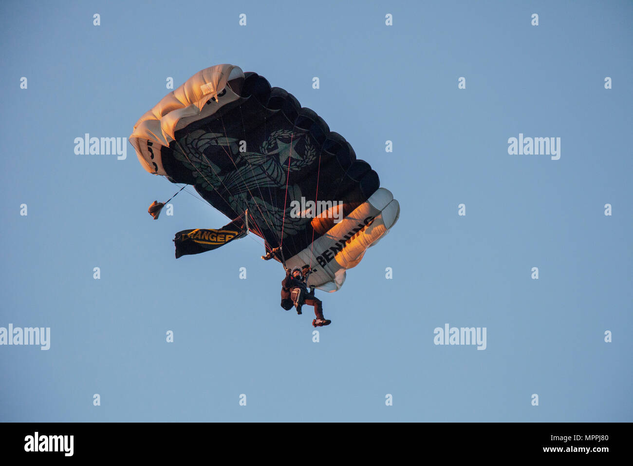 A U.S. Army parachutist from the Fort Benning Silver Wings Parachute ...