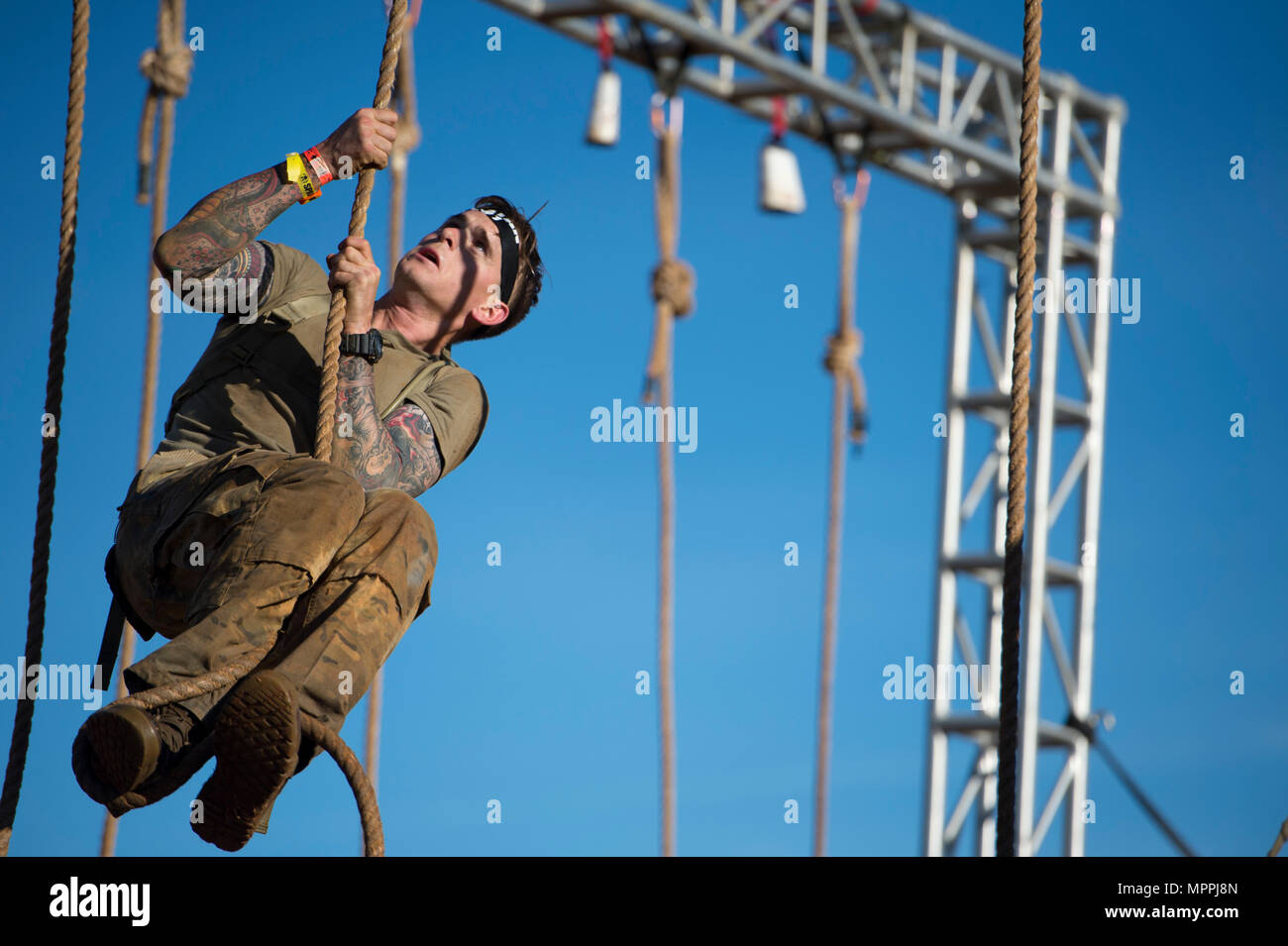 A U.S. Army Ranger competes in the Spartan Race during the Best Ranger ...