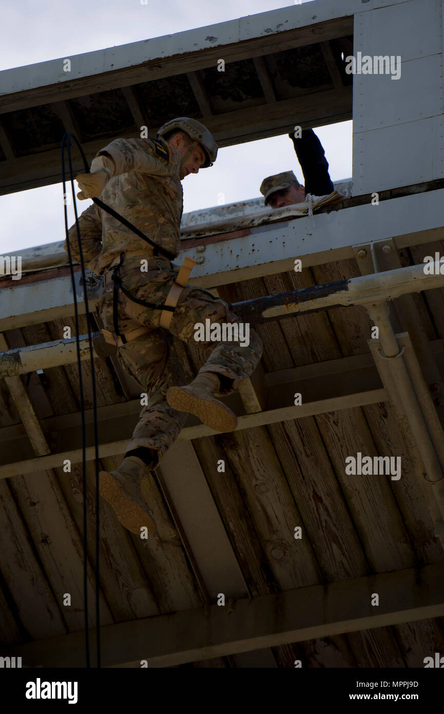 A U.S. Army Ranger repels down a tower during the Best Ranger ...