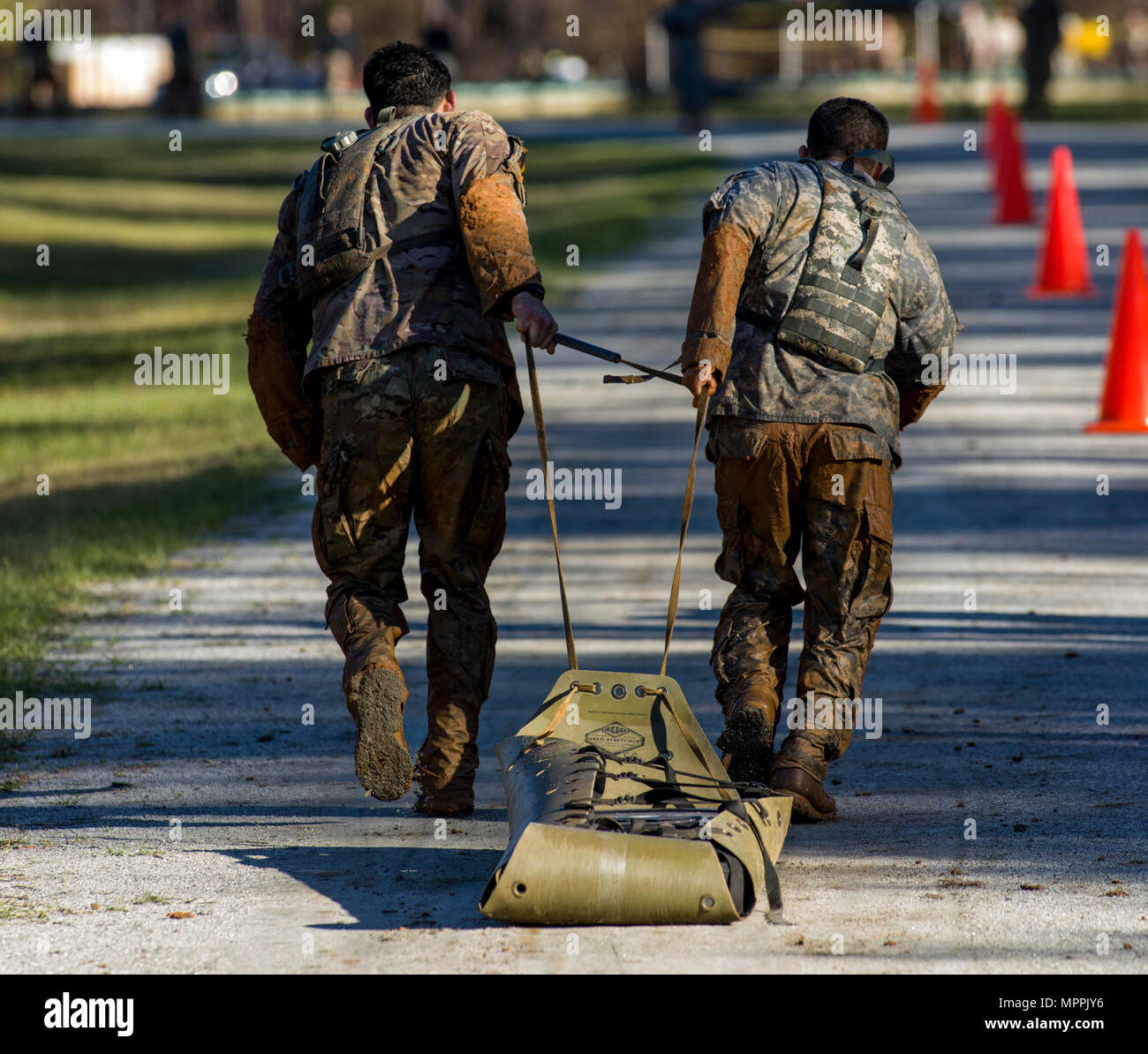 U.S. Army Rangers drag a litter during the Malvesti Obstacle Course at ...