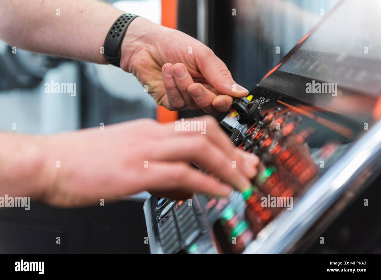 Man operating machines hi-res stock photography and images - Alamy