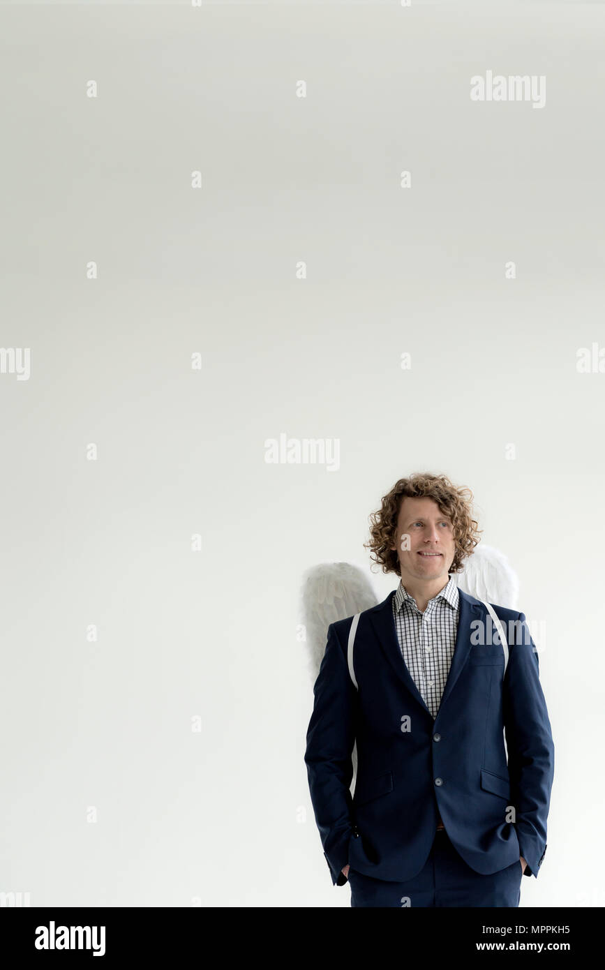 Businessman wearing suit angels wings hi-res stock photography and ...