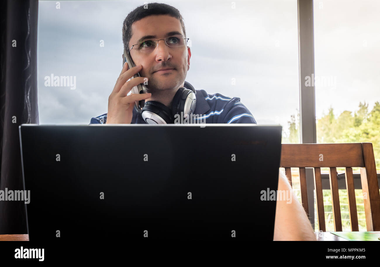 Man working from home Stock Photo - Alamy