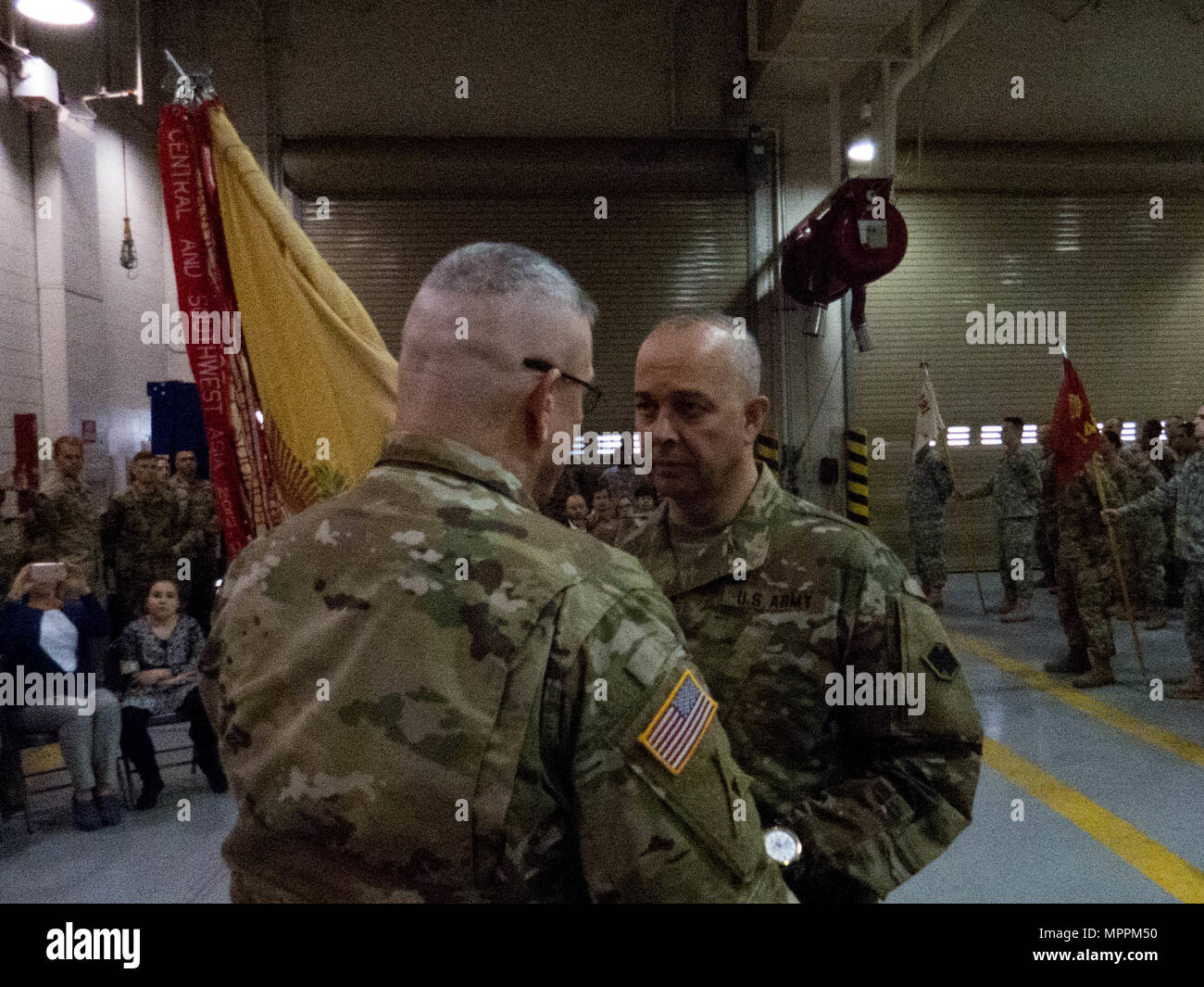 Col. Robert Moriarty, commander of the 96th Sustainment Brigade, passes ...