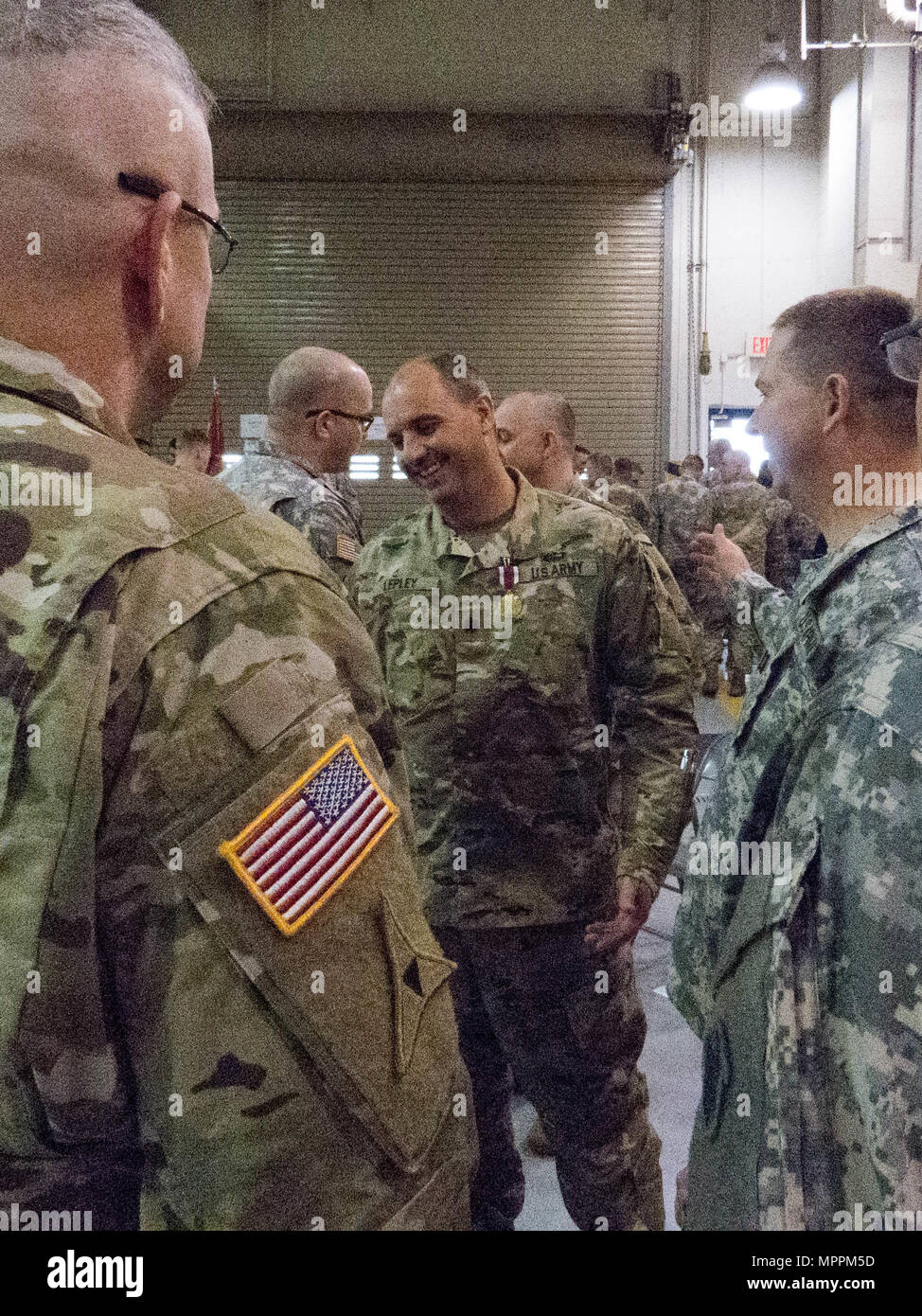 U.S. Army Reserve soldiers congratulate and thank outgoing commander of ...